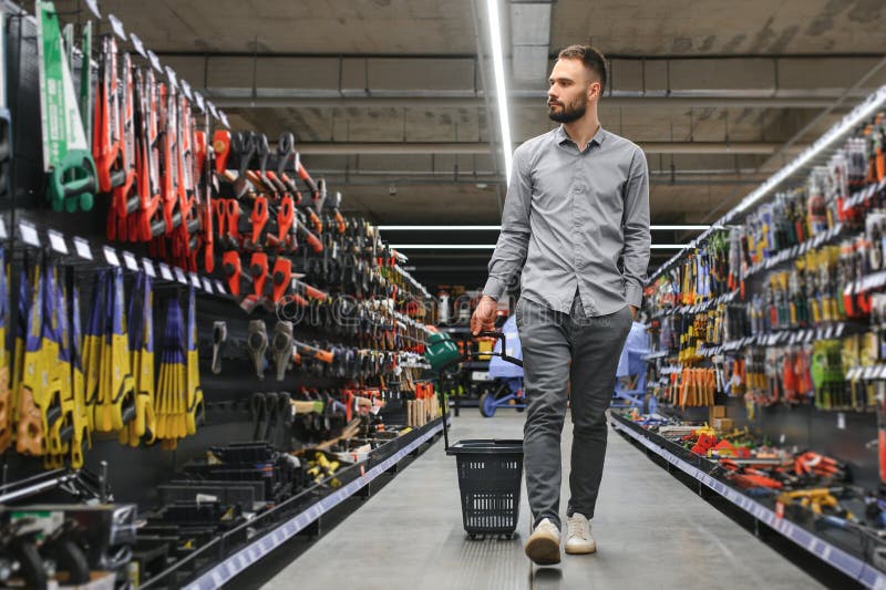 Portrait of Happy Mature Man Standing in Hardware Store Stock Photo ...