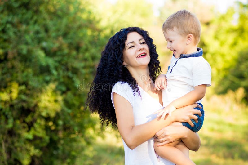 Portrait of Happy Mother and Son Smiling Stock Photo - Image of outside ...