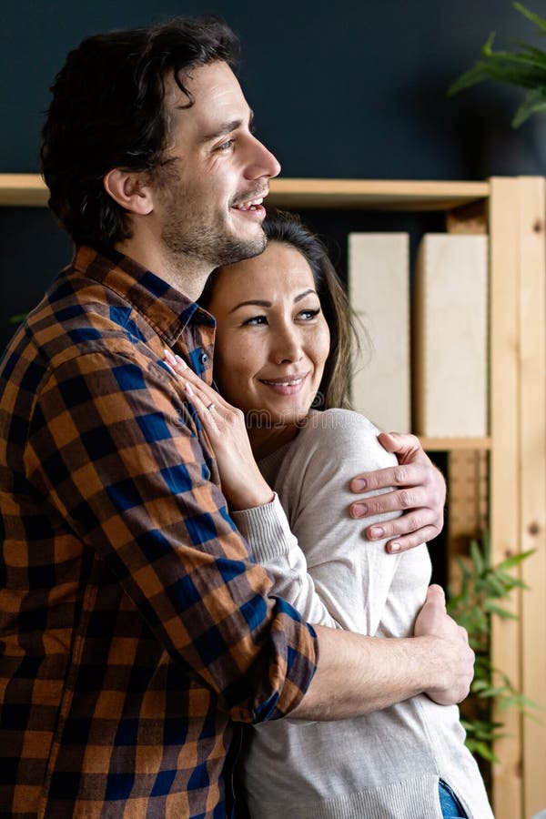 Portrait Of Happy Multiethnic Couple Enjoying Romantic Moments Together