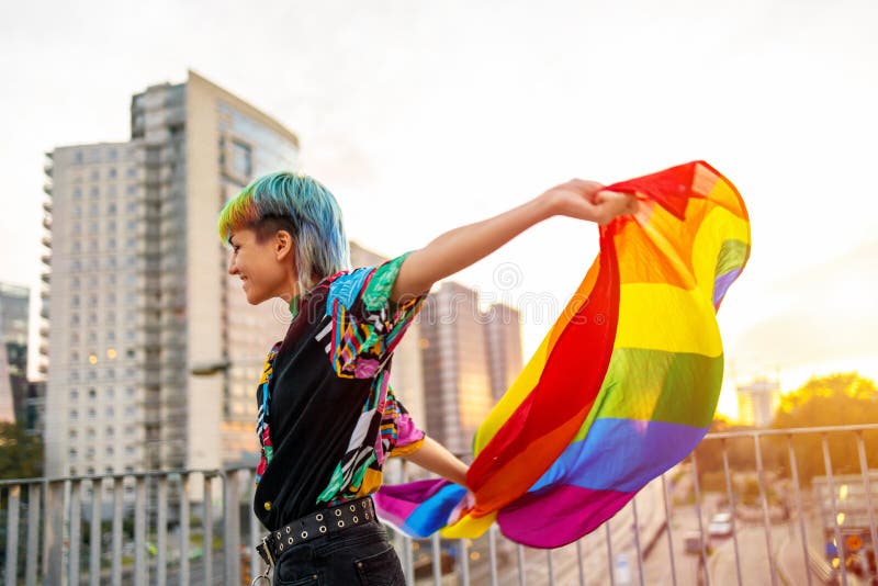 Portrait of Happy Non-binary Person Waving Gender Fluid Flag Stock ... Portrait of Happy Non-binary Person Waving Gender Fluid Flag Stock ...