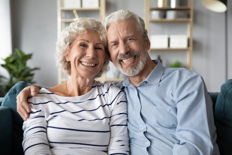 Portrait Of Happy Old Couple Hug Relaxing On Couch Stock Image Image