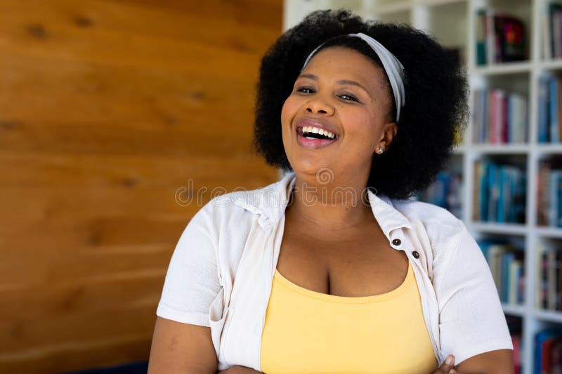 Portrait Of Happy Plus Size African American Woman Looking At Camera