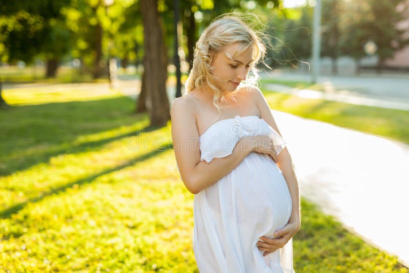 Portrait Of A Happy Pregnant Woman In A Park Stock Image Image Of
