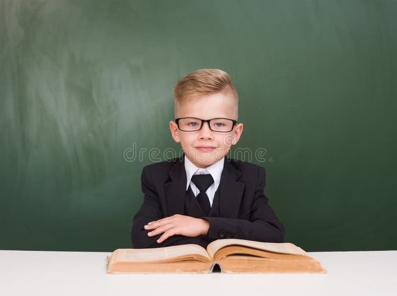 Portrait of a Happy Schoolboy with Book Stock Photo - Image of ...