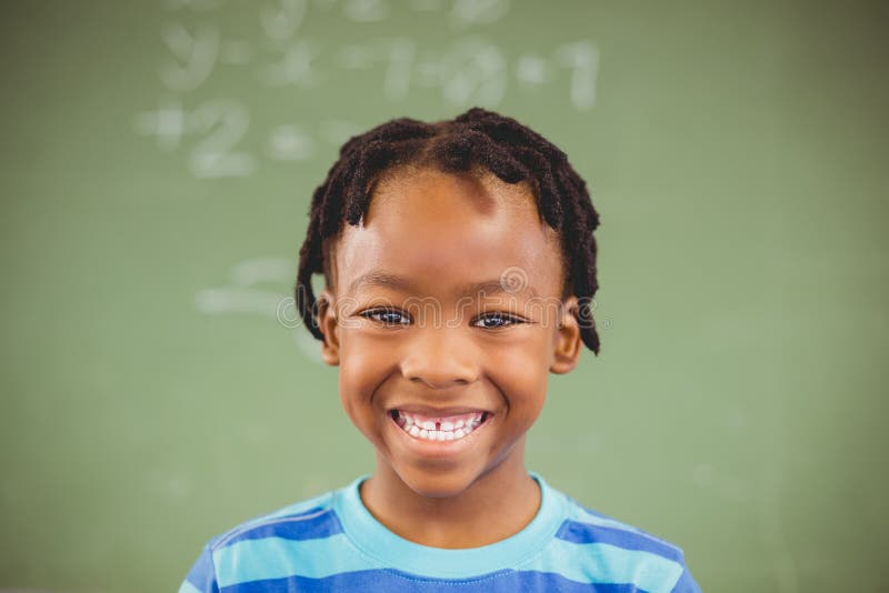 Portrait of Happy Schoolboy Smiling in Classroom Stock Image - Image of ...