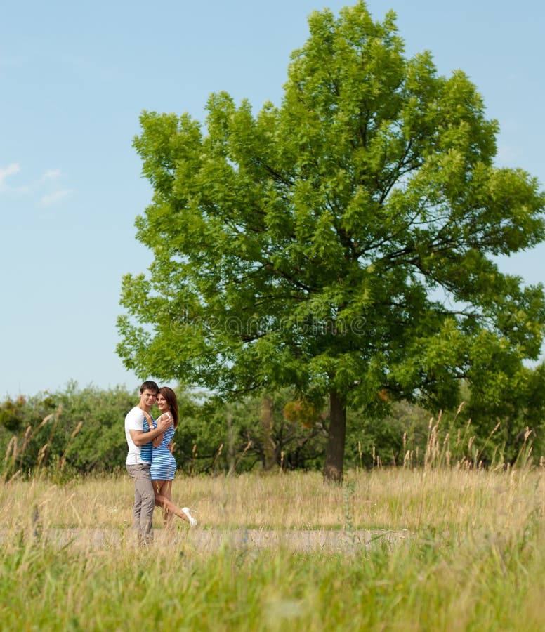 Portrait of a Happy Smiling Couple Near Oak Tree Stock Image - Image of ...