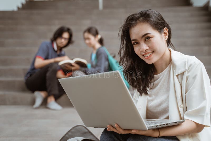 Portrait Happy Students Holding Laptops Stock Image - Image of ...