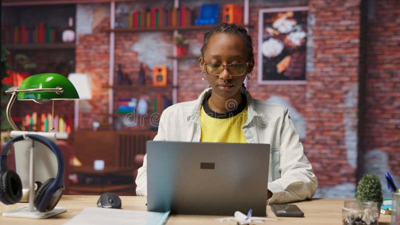 Portrait of Happy Teleworker Using Laptop in Home Office To Write ...