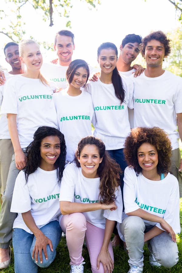 Portrait of Happy Volunteers Stock Image - Image of park, mixedrace ...