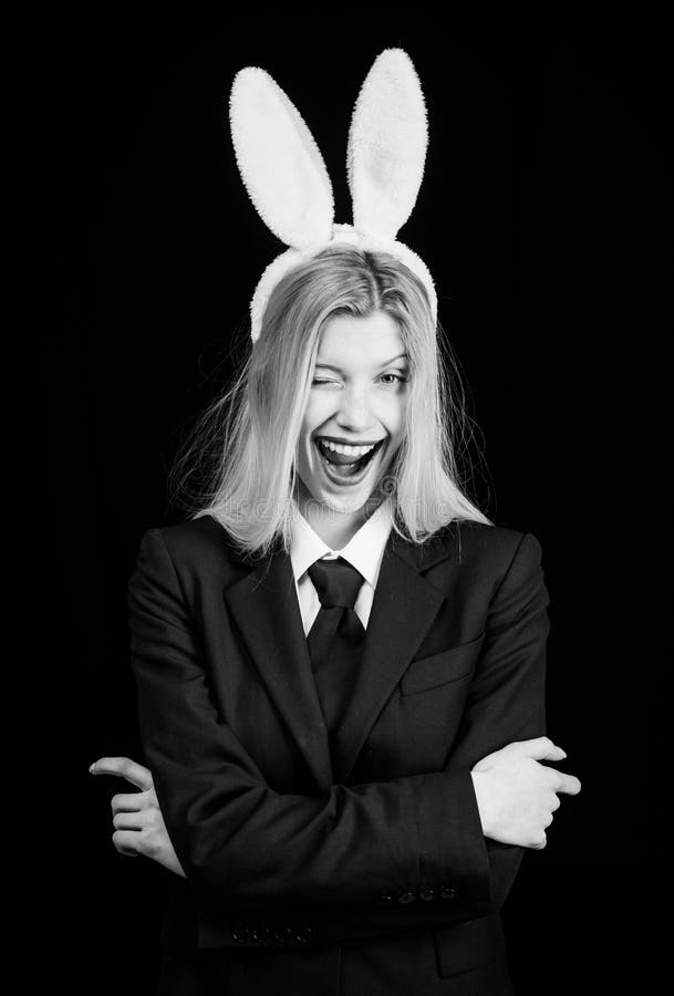 Portrait Of A Happy Woman In Bunny Ears Winking Closeup Of Winking