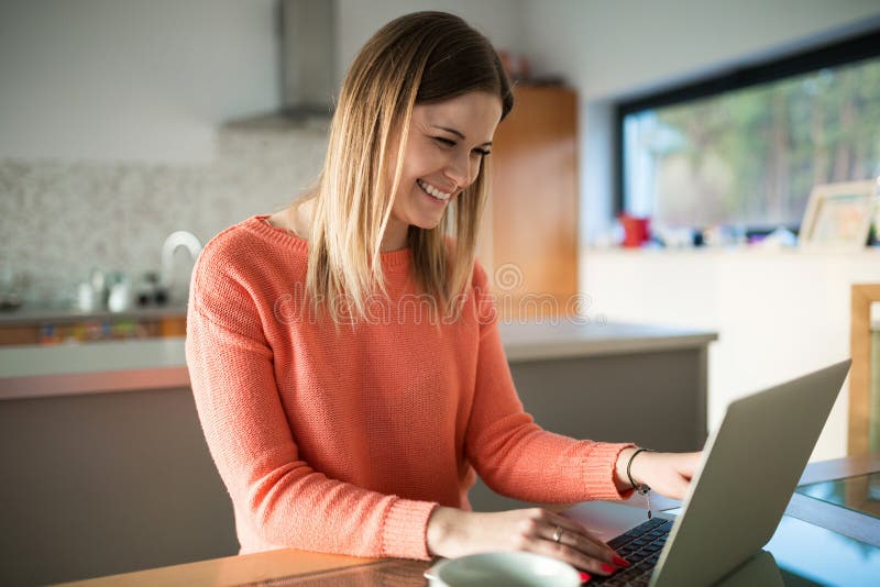 Happy Woman Working at Home on Notebook Stock Photo - Image of ...