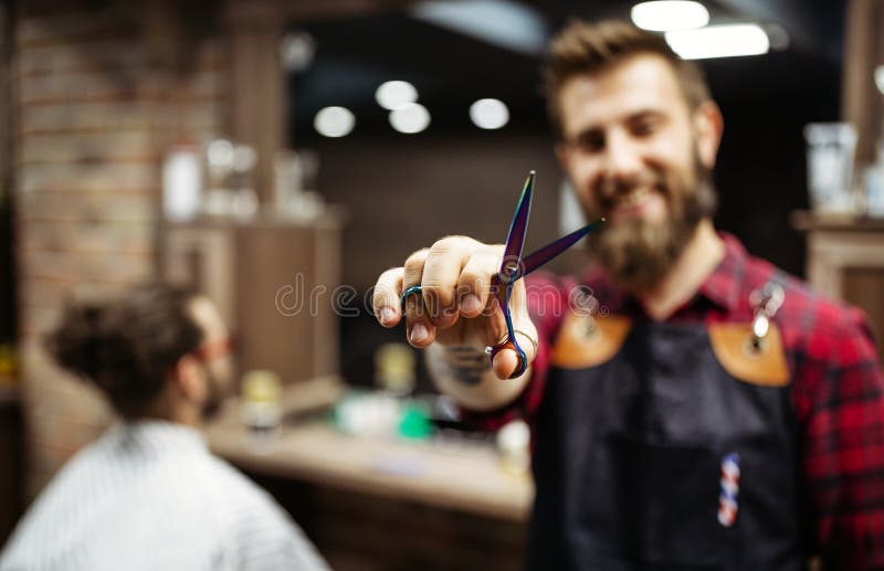 Portrait of Happy Young Barber with Client at Barbershop and Smiling ... Portrait of Happy Young Barber with Client at Barbershop and Smiling ...