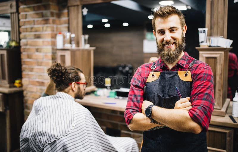 Portrait of Happy Young Barber with Client at Barbershop and Smiling ... Portrait of Happy Young Barber with Client at Barbershop and Smiling ...