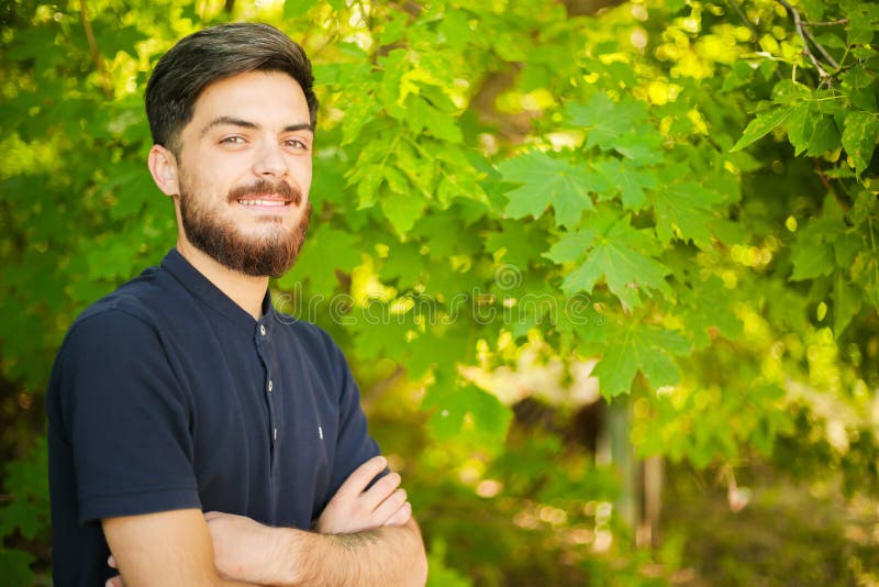 Portrait of Happy Young Bearded Man Outside. Stock Photo - Image of ...