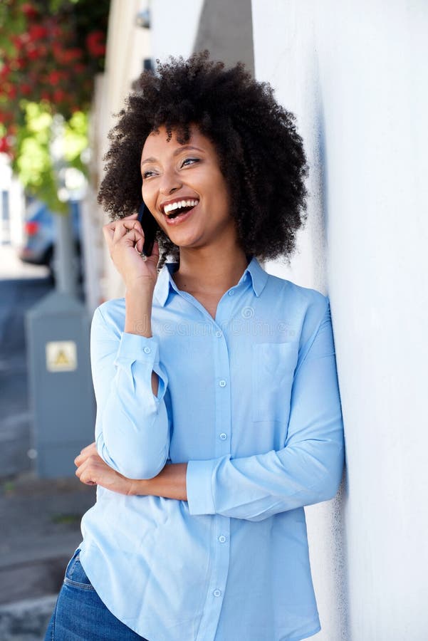 Happy Young Black Woman Smiling and Talking on Cellphone Stock Image ... Happy Young Black Woman Smiling and Talking on Cellphone Stock Image ...