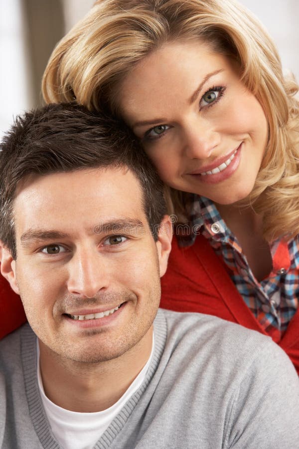 Portrait of Happy Young Couple at Home Stock Image - Image of happy ...