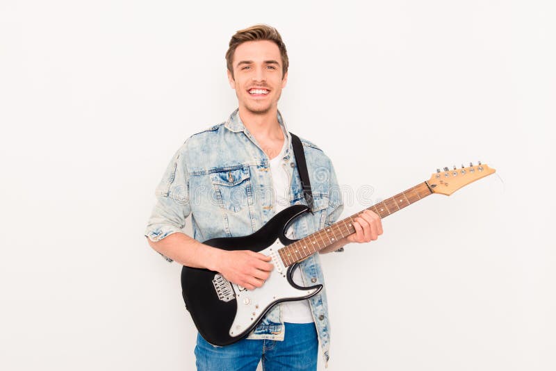 Portrait of Happy Young Man Playing on Electric Guitar Stock Photo ...