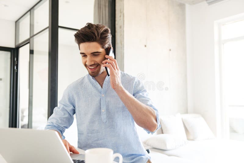 Portrait of a Happy Young Man Using Laptop Computer Stock Photo - Image ...