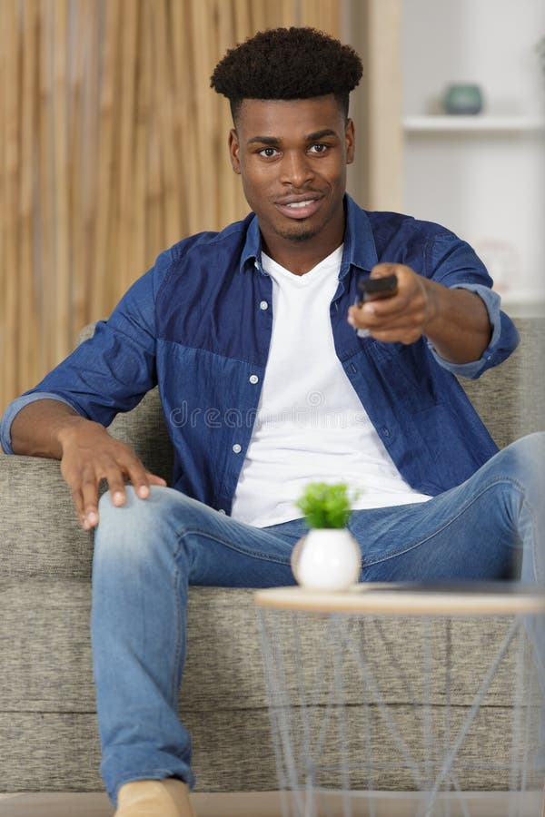 Portrait Happy Young Man Watching Tv Stock Photo - Image of indoors ...