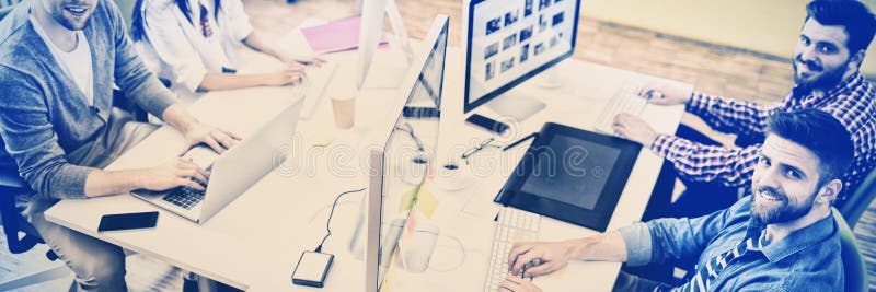 Portrait of Professionals Working at Creative Office Stock Photo ...
