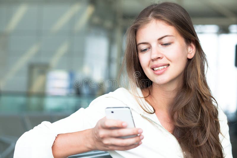 Portrait of Happy Young Woman Using Mobile Phone Stock Image - Image of ...