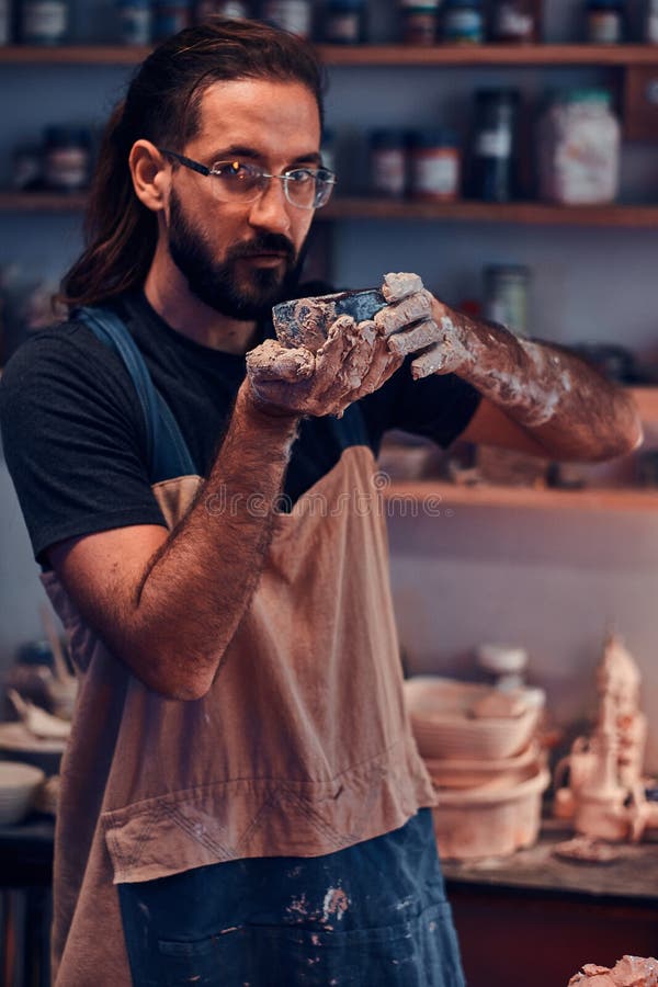 Hrdworking Man with Clay at His Own Studio. Stock Image - Image of ...