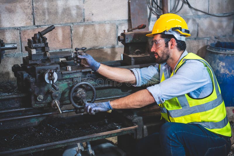 Portrait of Heavy Industry Workers Working on the Metal Fabrication ...