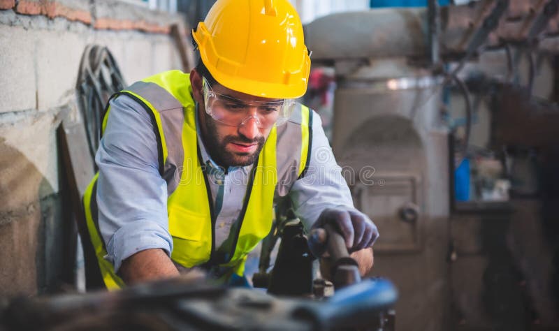 Portrait of Heavy Industry Workers Working on the Metal Fabrication ...