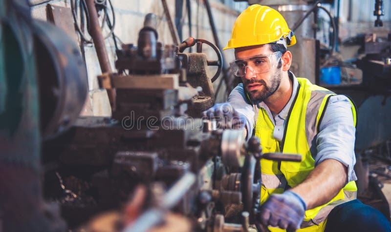 Portrait of Heavy Industry Workers Working on the Metal Fabrication ...