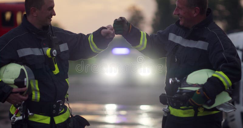 Portrait of a Heroic Fireman in a Protective Suit. Firefighter in Fire ...