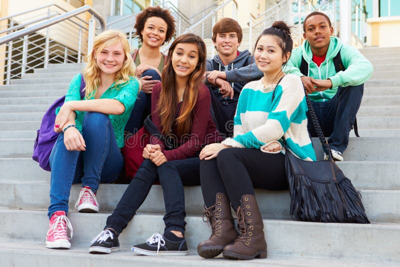 Portrait of High School Students Sitting Outside Building Stock Image ...