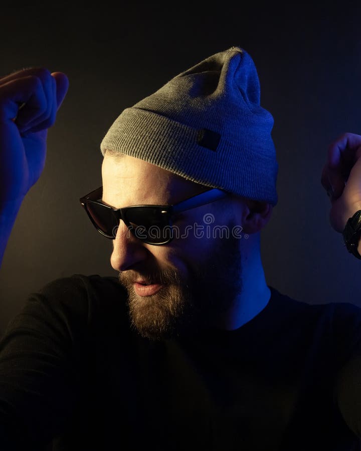Portrait of a Hipster Guy with Color Light. Hipster Face Portrait in ...