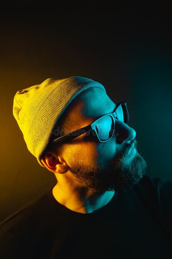 Portrait of a Hipster Guy with Color Light. Hipster Face Portrait in ...