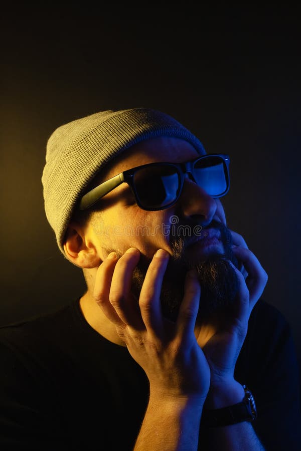 Portrait of a Hipster Guy with Color Light. Hipster Face Portrait in ...