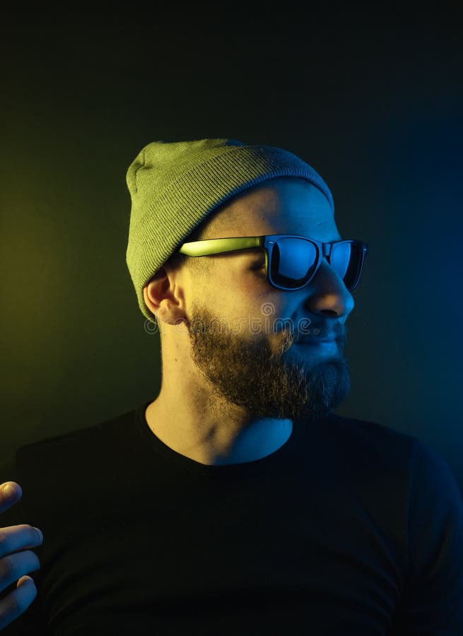 Portrait of a Hipster Guy with Color Light. Hipster Face Portrait in ...