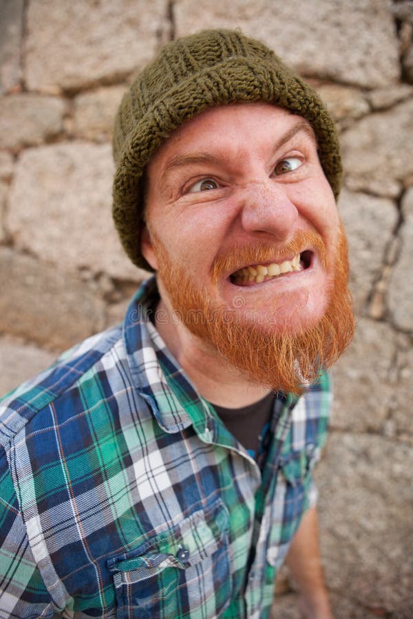 Portrait of a Hipster Guy Putting Silly Face Stock Photo - Image of ...