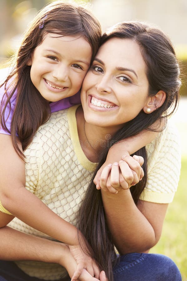 Portrait of Hispanic Mother and Daughter in Park Stock Image - Image of ...
