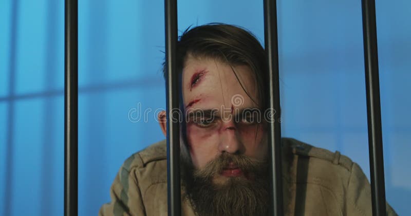 Portrait of Prisoner Talking on Phone in Prison Cell Stock Video ...