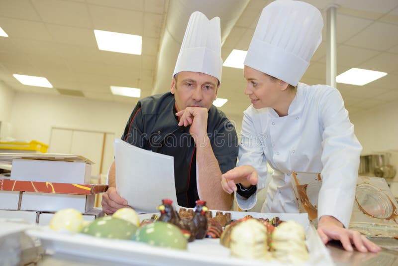 Portrait Hospitable Chef with Young Smiling Female Helper Stock Photo ...