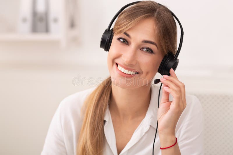 Portrait of Hotline Operator in Headset Smiling Sitting in Office Stock ...