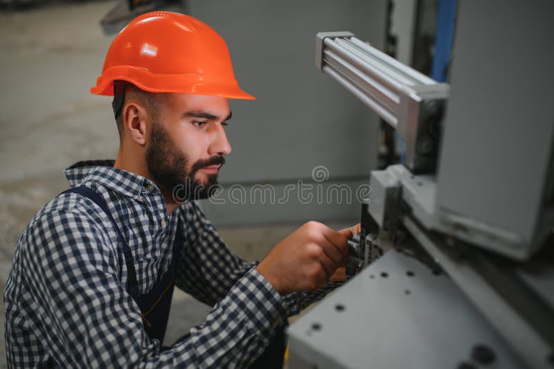 Portrait of Industrial Engineer. Factory Worker with Hard Hat Standing ...