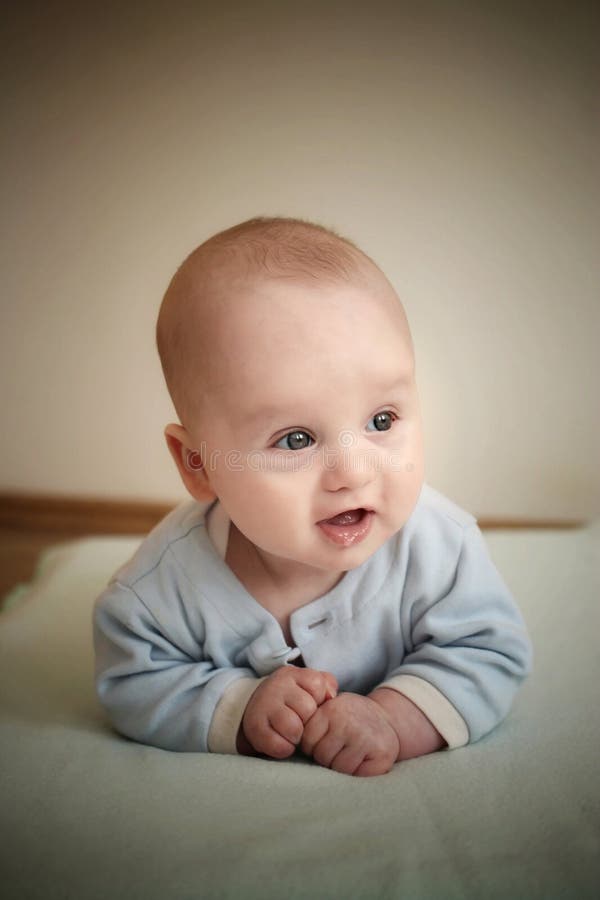 Portrait of Infant Baby during Tummy Time Stock Photo - Image of lying ...