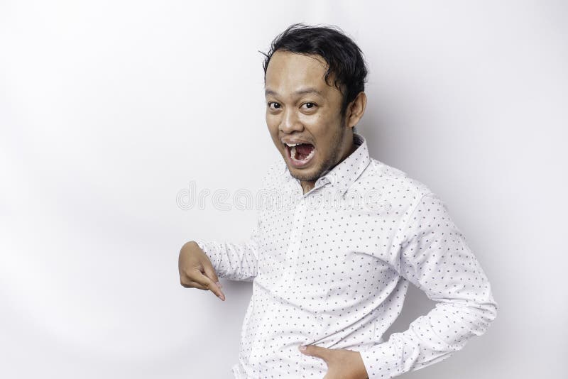 A Portrait of Insecure Asian Fat Man is Holding the Fat on His Belly ...