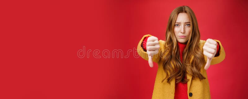 Portrait Of Insecure And Unconfident Cute Redhead Female Reacting To