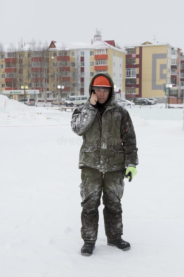 Portrait of an Installer Talking on a Mobile Phone Stock Image - Image ...
