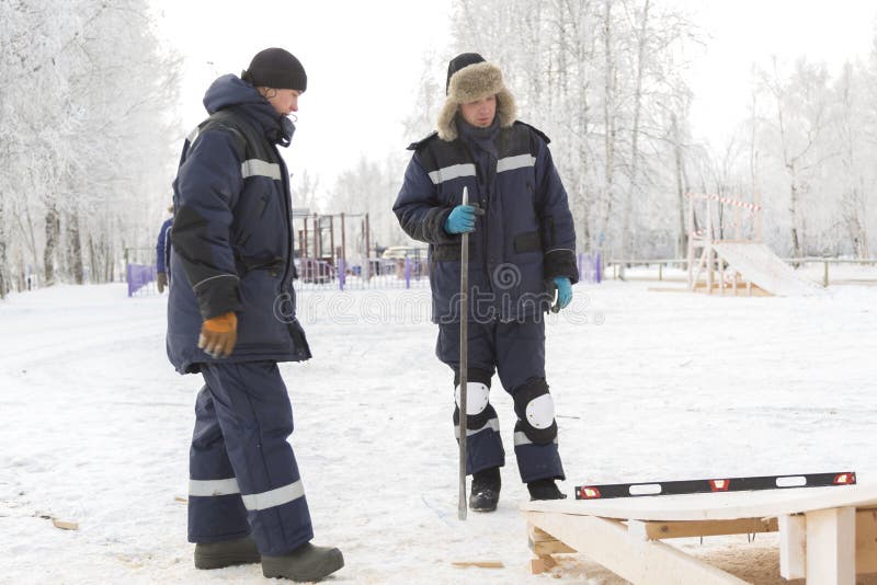 Portrait of Installers when Working with a Level Stock Image - Image of ...