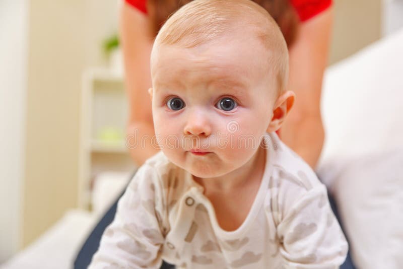 Portrait of Interested Baby Playing with Mother Stock Photo - Image of ...