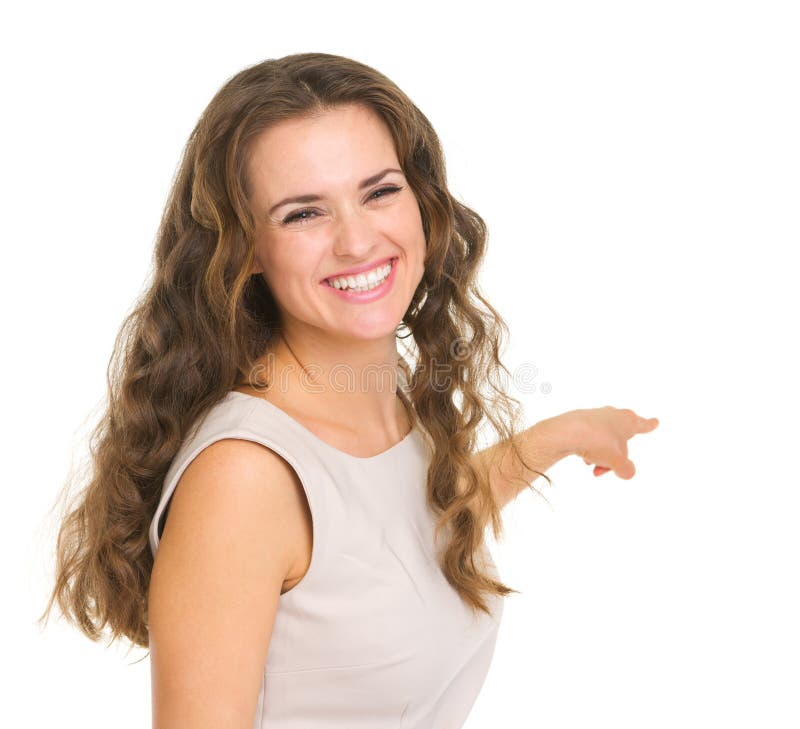 Portrait of Interested Young Woman Pointing Back Stock Photo - Image of ...