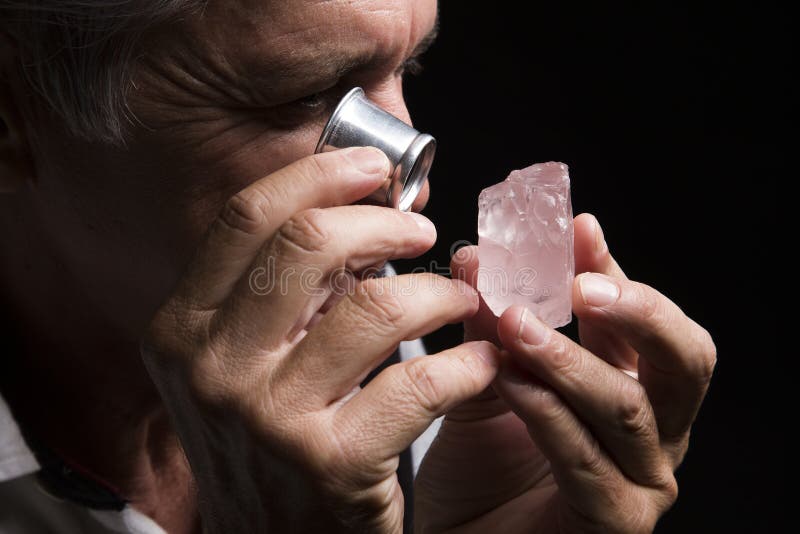 Portrait of a Jeweler during the Evaluation of Jewels. Stock Image ...