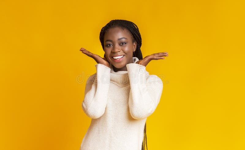 Portrait Of Joyful Black Girl Touching Her Cheeks With Hands Stock
